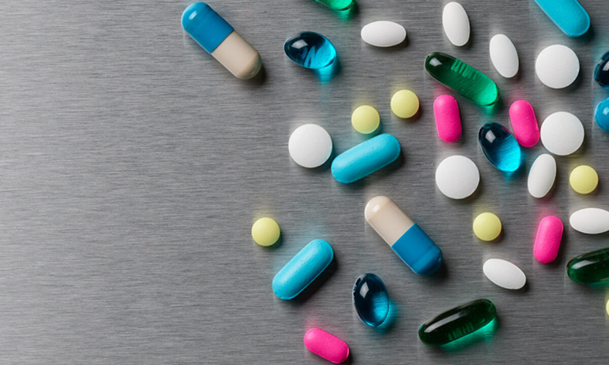 Drug Plastics Logo